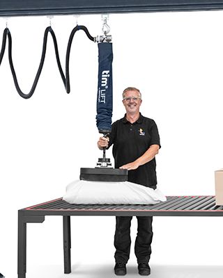 Vacuum hose lifters, vacuum lifting systems, crane systems